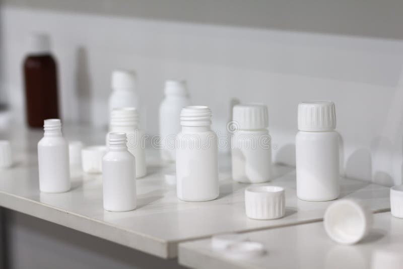 Various Empty Medicine Bottles on the Shelf Stock Photo - Image of ...