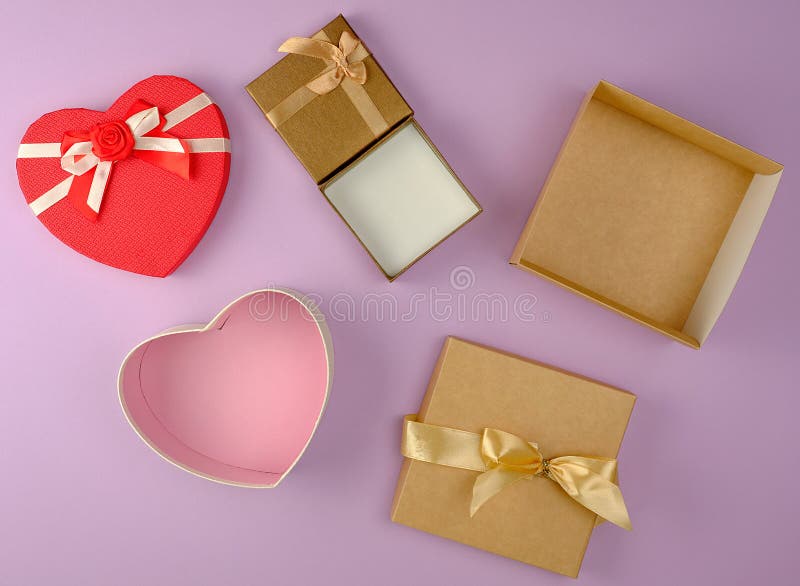 Various Empty Open Paper Gift Boxes on Purple Background Stock Image ...