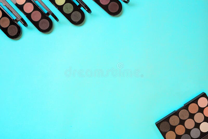 Various Eyeshadow on Blue Background Stock Photo - Image of palette ...