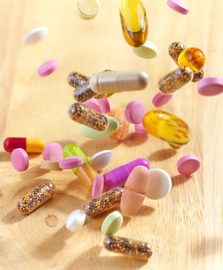 Various falling pills stock image. Image of antibiotic - 42879583