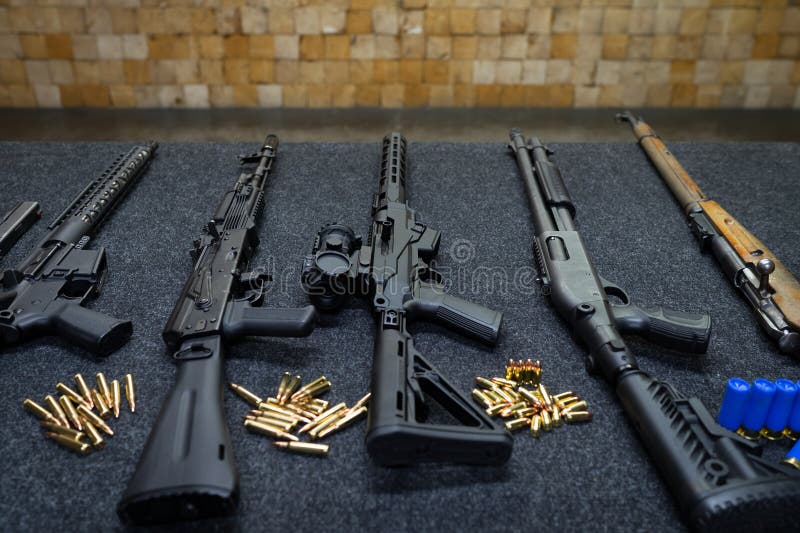 Various Firearms on a Table in a Shooting Range, Close Up Stock Image ...