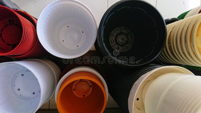 A Shot of Flower Pots of Various Colors Stock Image - Image of iron ...