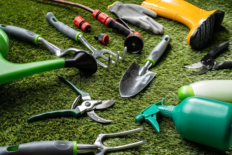 Various Gardening Tools Laying on Grass Stock Photo - Image of ...