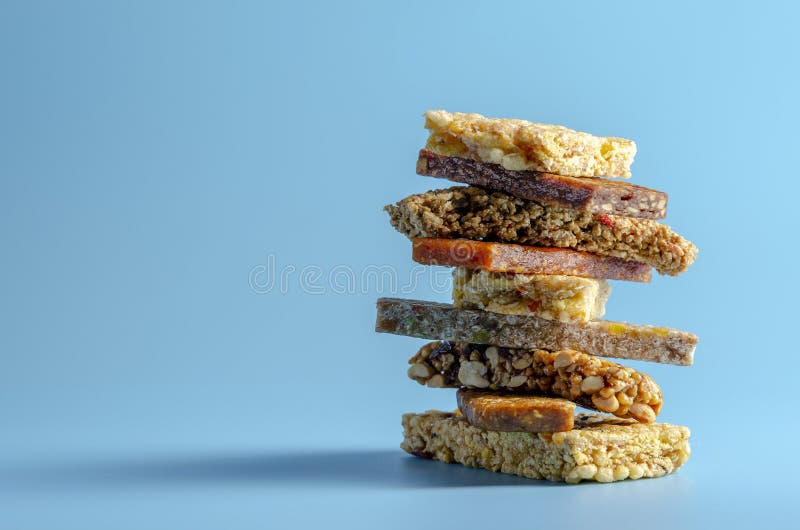 Various Granola Bars Isolated on Blue Background Stock Image - Image of ...