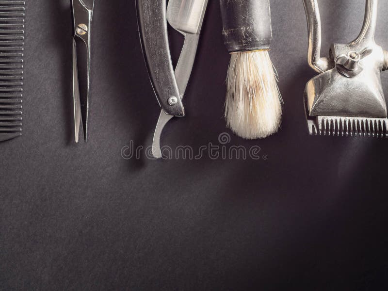 Various Grooming Tools are Organized on a Dark Surface, Including ...