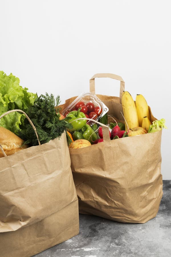 Various Healthy Food in Paper Bag on Gray Background Stock Image ...