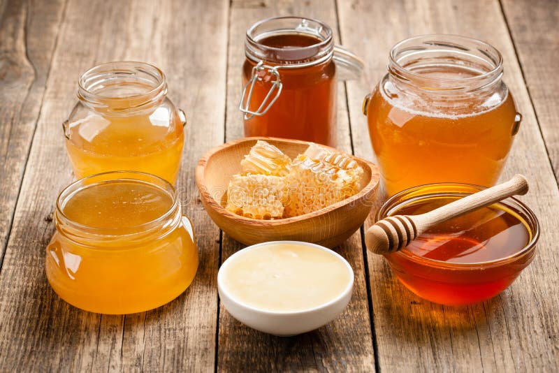 Various Honey on Wooden Table Stock Photo - Image of product, fresh ...