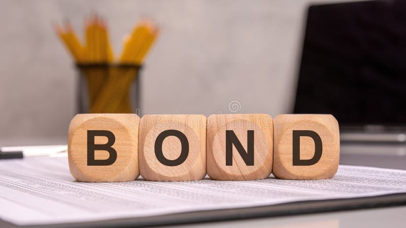 Various Investment Bonds are Displayed on a Table Alongside Financial ...