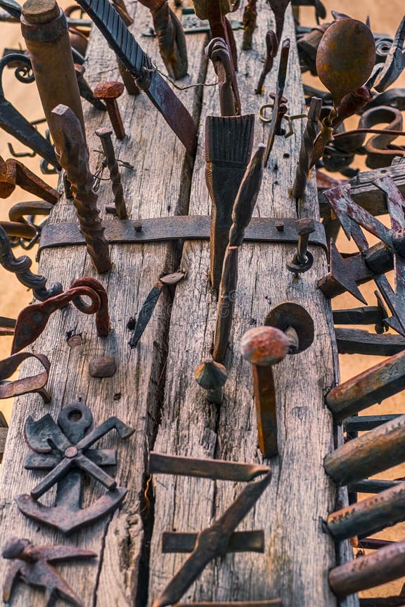 Various Iron Objects Stuck in Wood Stock Image - Image of objects ...