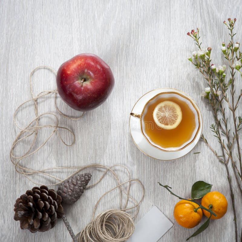 Various Items for Gift Wrapping are on Table. Cup of Tea with Lemon ...