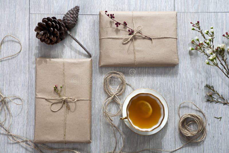 Various Items for Gift Wrapping are on Table. Gifts Already Packed ...