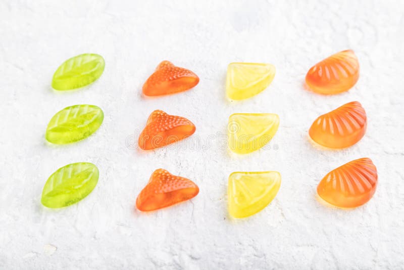 Various Jelly Candies on Gray Concrete Background. Close Up, Side View ...
