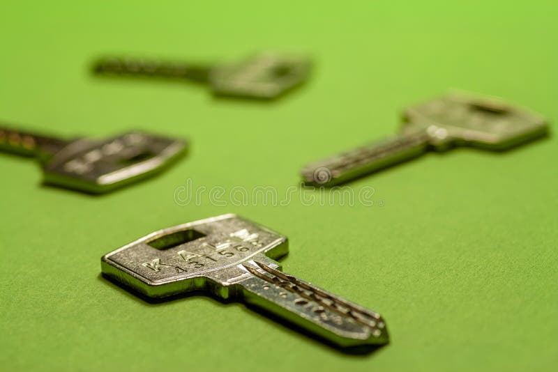 Various Keys on Green Background Stock Photo - Image of concept ...