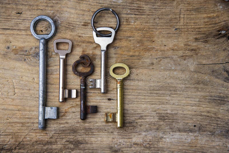 Various Keys on a Rustic Wooden Board, Copy Space Stock Image - Image ...