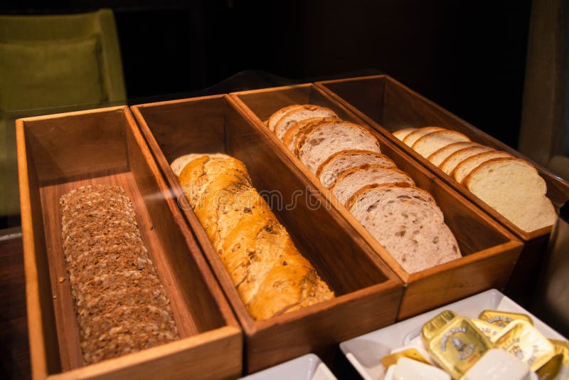 Various Kind of Breads in a Wooden Box on a Breakfast Buffet Stock ...