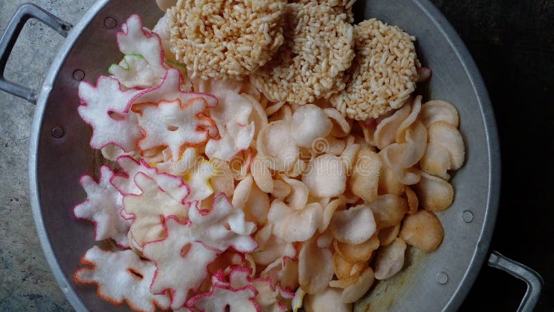 Various Kinds of Crackers. Crispy Crackers are Placed in the Pan. One ...