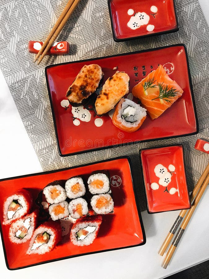 Various Kinds of Sushi Served on Red Plate Stock Image - Image of fish ...