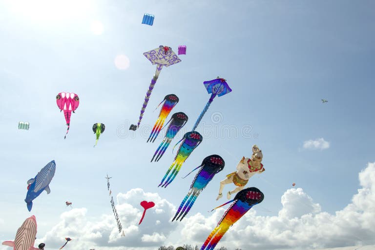 Various Kites in the Sky and Sun Rays Stock Photo - Image of activity ...