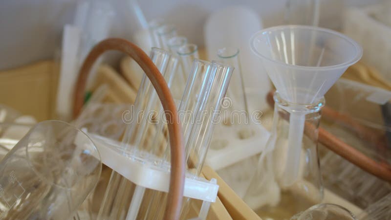 Various Lab Glassware and Tools in Plastic Boxes on Table Stock Footage ...