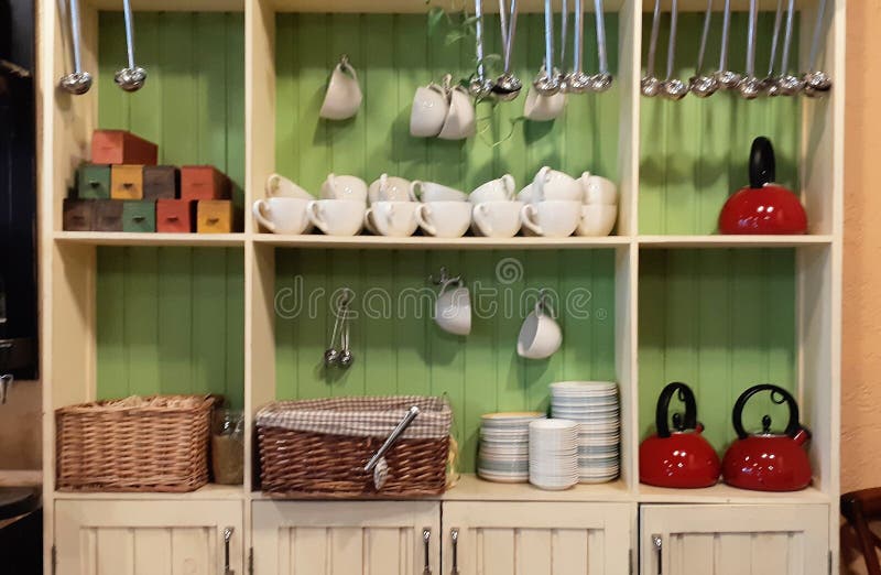 Various Lovely Accessories Standing on Shelf and Cupboard in Cozy ...
