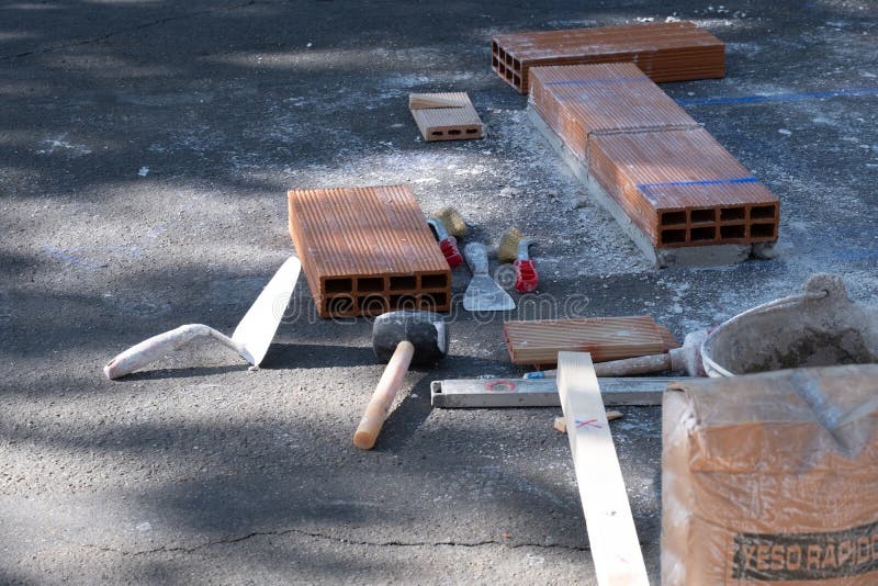 Various Masonry and Brickwork Tools Being Used on a Construction Site ...