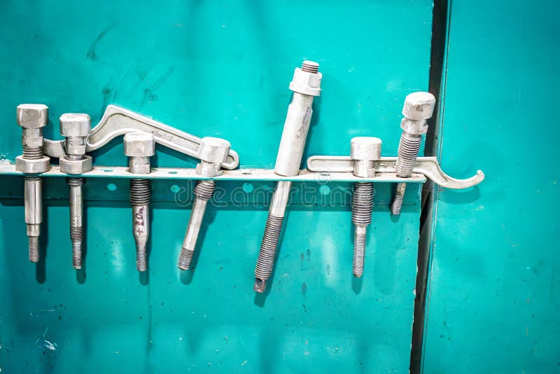 Various Metal Tools for Turning Work Arranged on a Blue Background at a ...