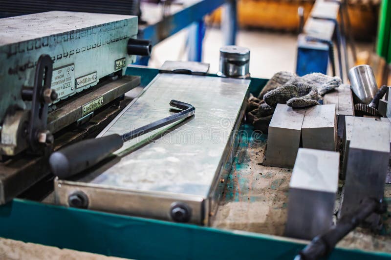 Various Metalworking Tools Arranged on a Workbench in a Workshop ...