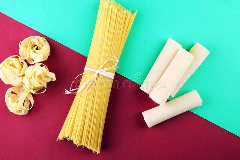 Various Mix of Pasta Flat Lay on Colored Paper. Diet and Food Co Stock ...