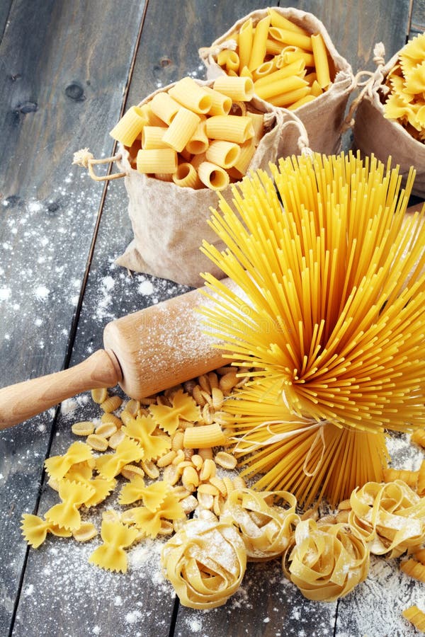 Various Mix of Pasta on Grey Rustic Background. Diet and Food Co Stock ...