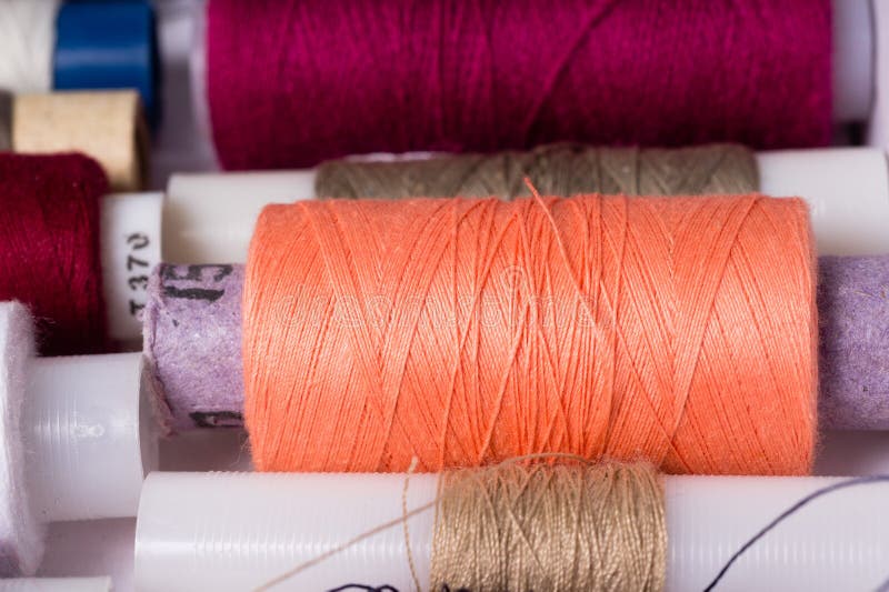 Various Multicolored Used Sewing Threads in a Box, Stacked in a Stock ...