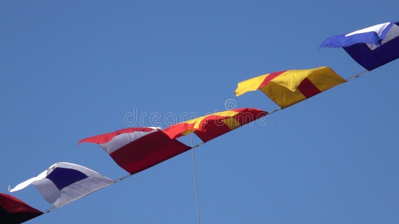 Various Nautical Flags Tied Together with Rope, Ship Flags Signals ...