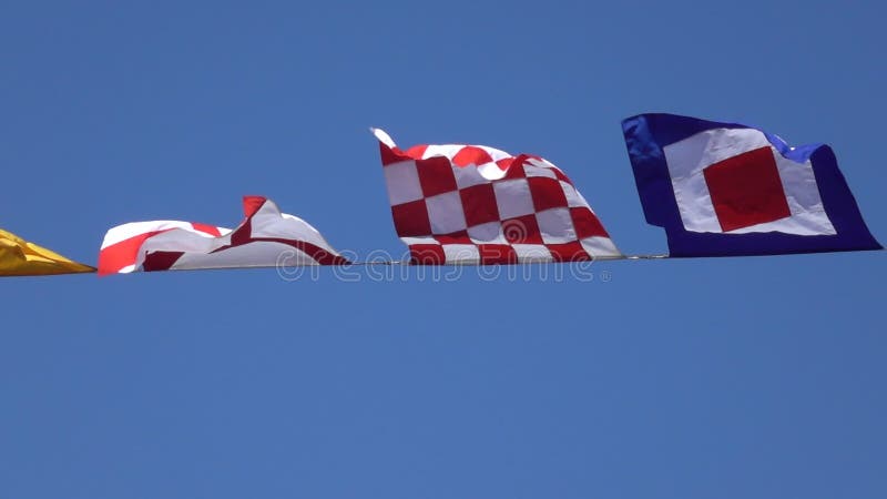Various Nautical Flags Tied Together with Rope, Ship Flags Signals ...