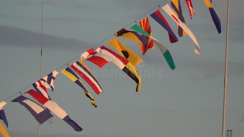 Various Nautical Flags Tied Together with Rope, Ship Flags Signals ...