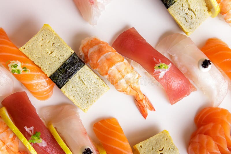 Various of Nigiri Sushi on White Plate Stock Photo - Image of table ...
