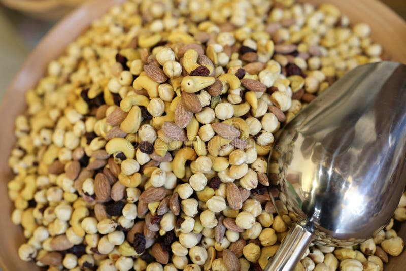 Various nuts on plate stock photo. Image of healthy - 139562094