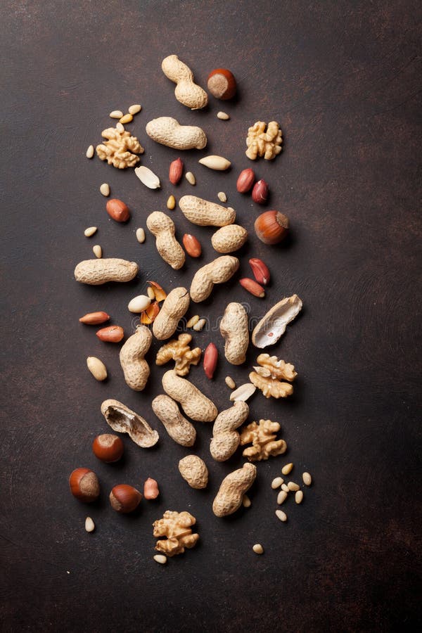 Various Nuts on Stone Table Stock Photo - Image of walnut, stone: 82358640