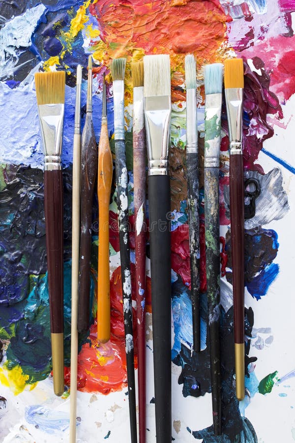 Various Paintbrushes on a Palette Stock Photo - Image of individuality ...