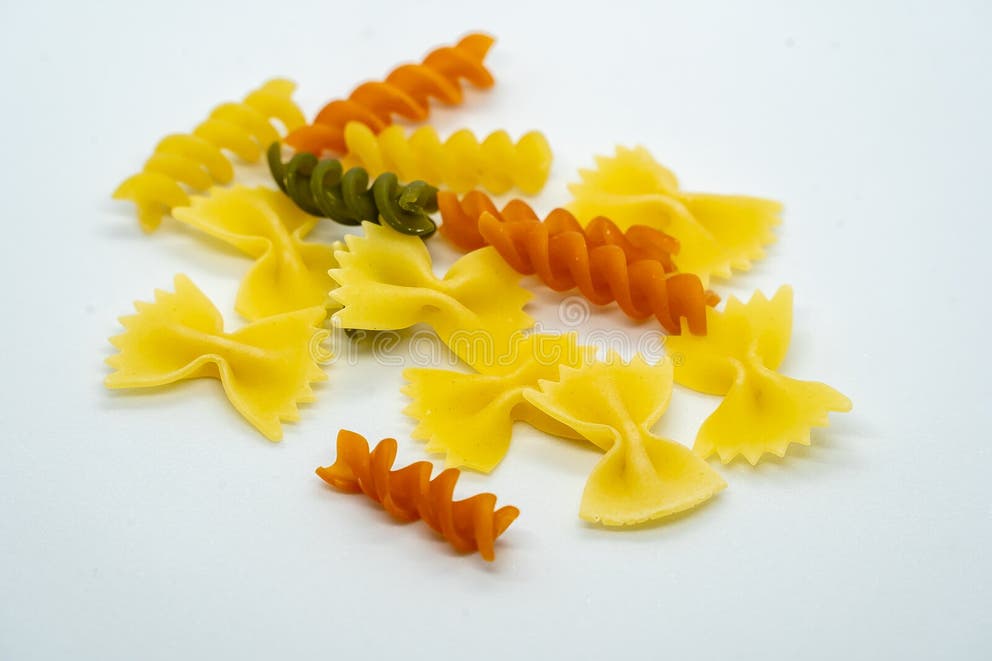 Several Types of Pasta Sitting on a Table Topper in the Shape of a Leaf ...