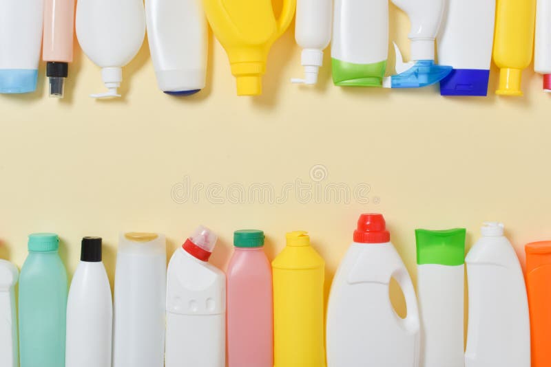Various Plastic Bottles Scattered on a Light Green Background Stock ...