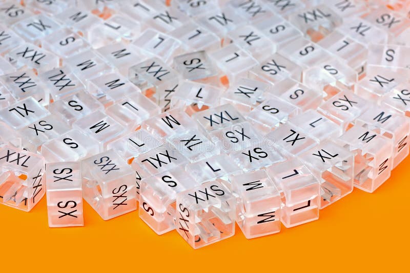 Various Plastic Clothing Size Tags, Plastic Size Labels Stock Photo ...