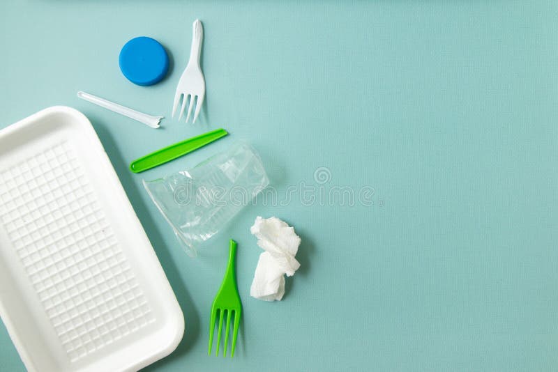 Various Plastic Trash on Blue Background, Waste Sorting and Recycling ...