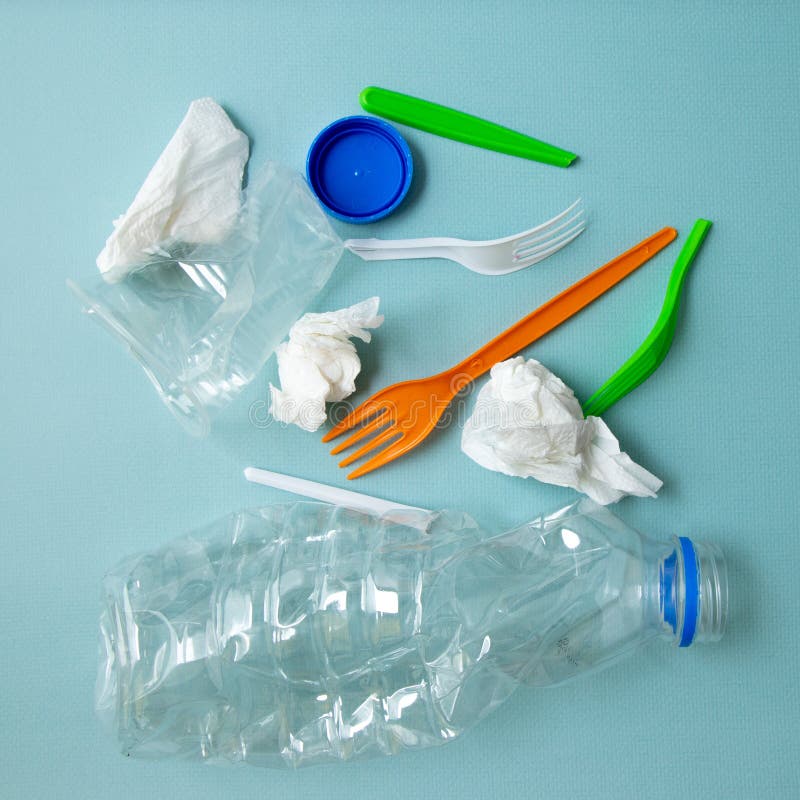 Various Plastic Trash on Blue Background, Waste Sorting and Recycling ...
