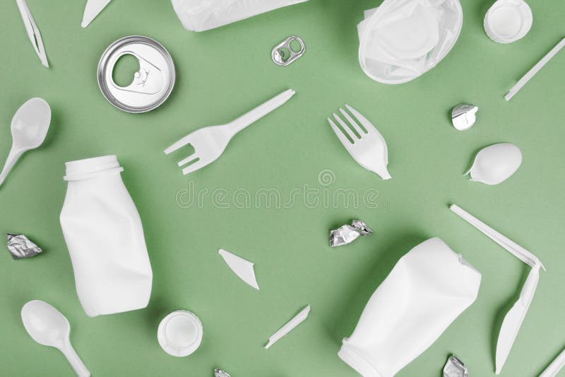 Various Recyclable Garbage on a Green Background Stock Photo - Image of ...