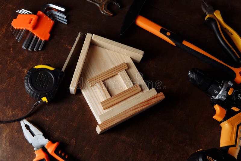 Various Repair Tools and Model of House. Equipment for Building Stock ...