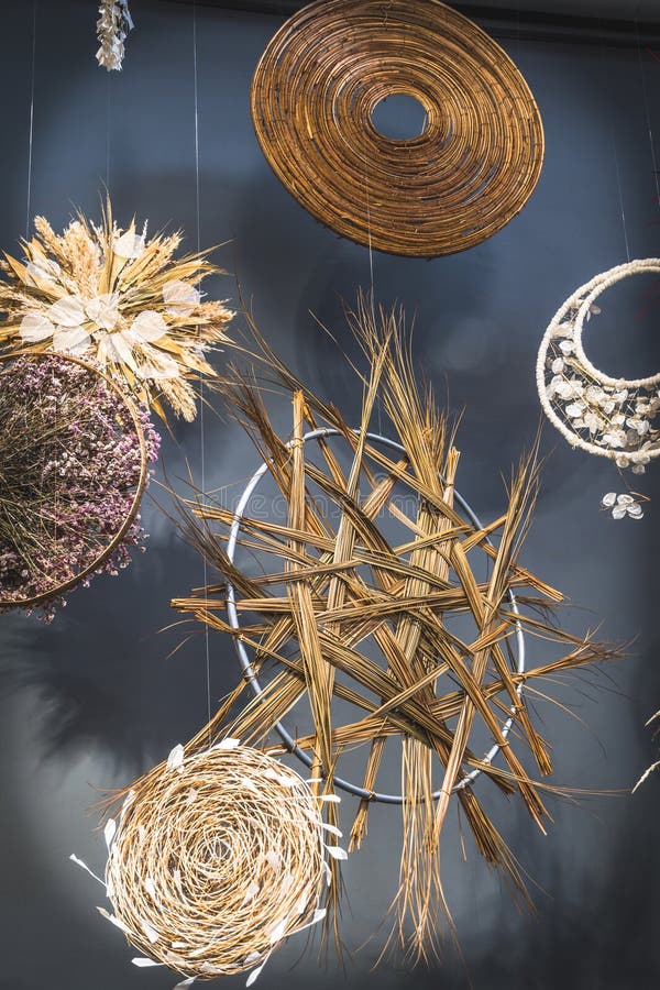 Various Round Decorative Objects Made from Natural Materials Hanging ...