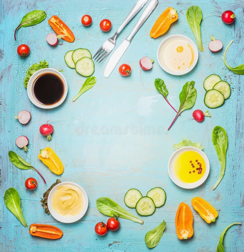Various Salad and Dressing Ingredients on Light Blue Background Stock ...