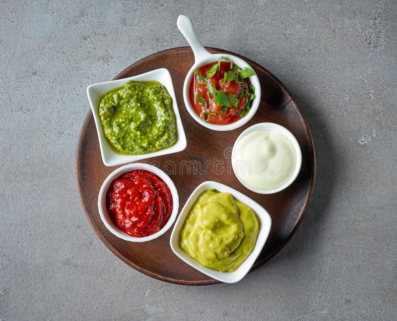 Various Sauces on Grey Table Stock Photo - Image of bowl, gourmet ...