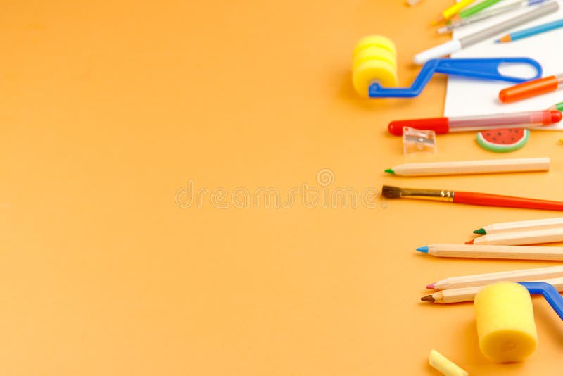 Various School Supplies on Orange Background Ready for Your Design ...