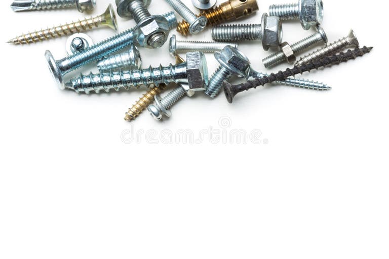 Various Screws and Bolts Scattered Across a White Surface Ready for ...