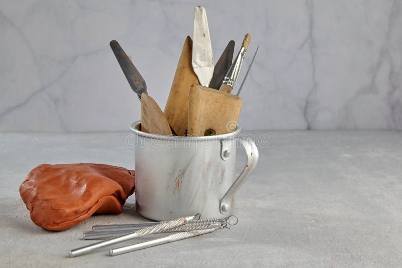 Various Sculpting Tools for Modeling and Pieces of Clay and Plasticine ...